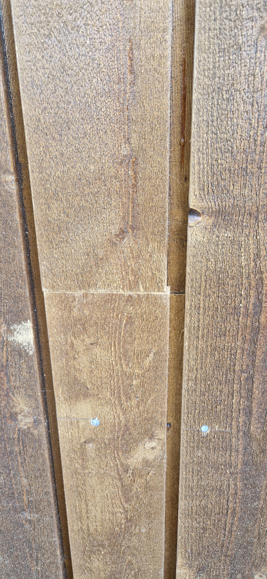 Utvendig panel på nytt hus under oppføring slår seg - ByggeBolig