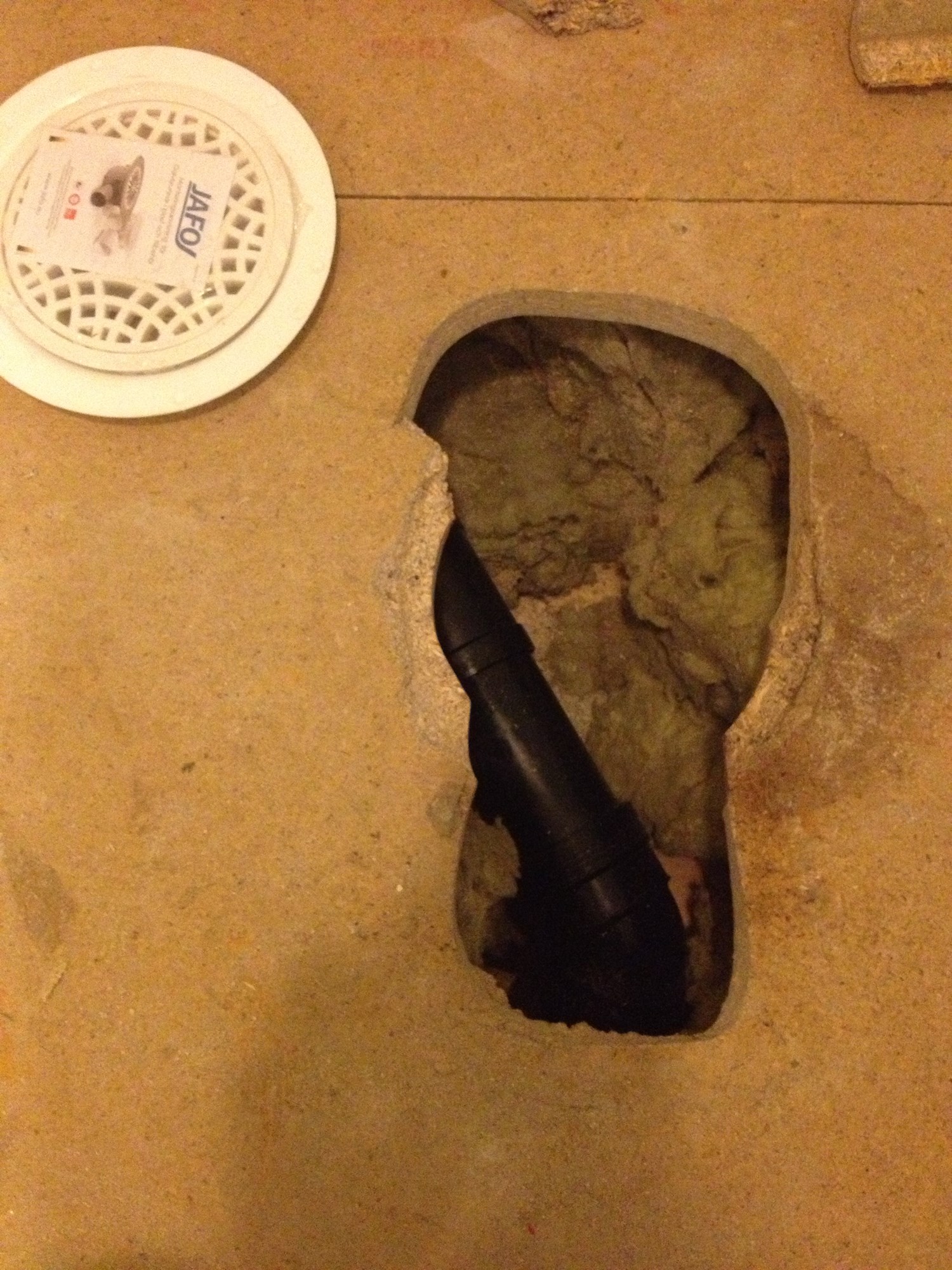 Tette hull i gulvspon etter flytting av sluk på bad - ByggeBolig